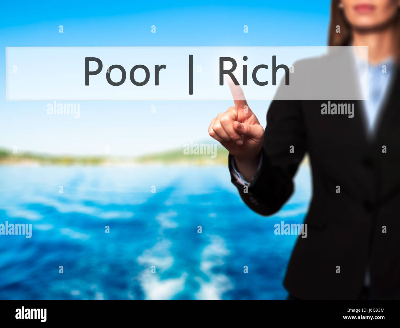 Poor Rich - Businesswoman hand pressing button on touch screen ...