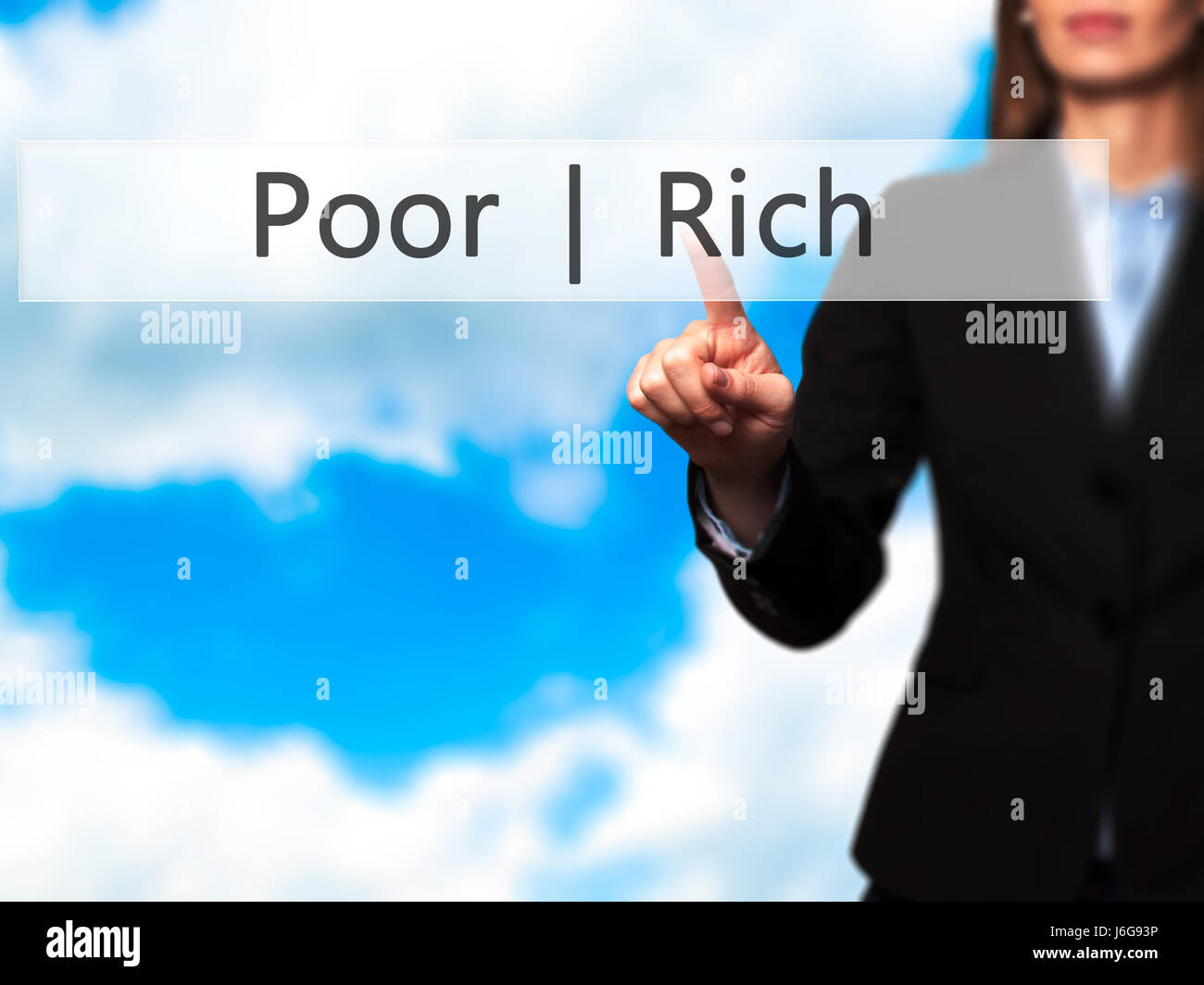 Poor Rich - Businesswoman hand pressing button on touch screen ...