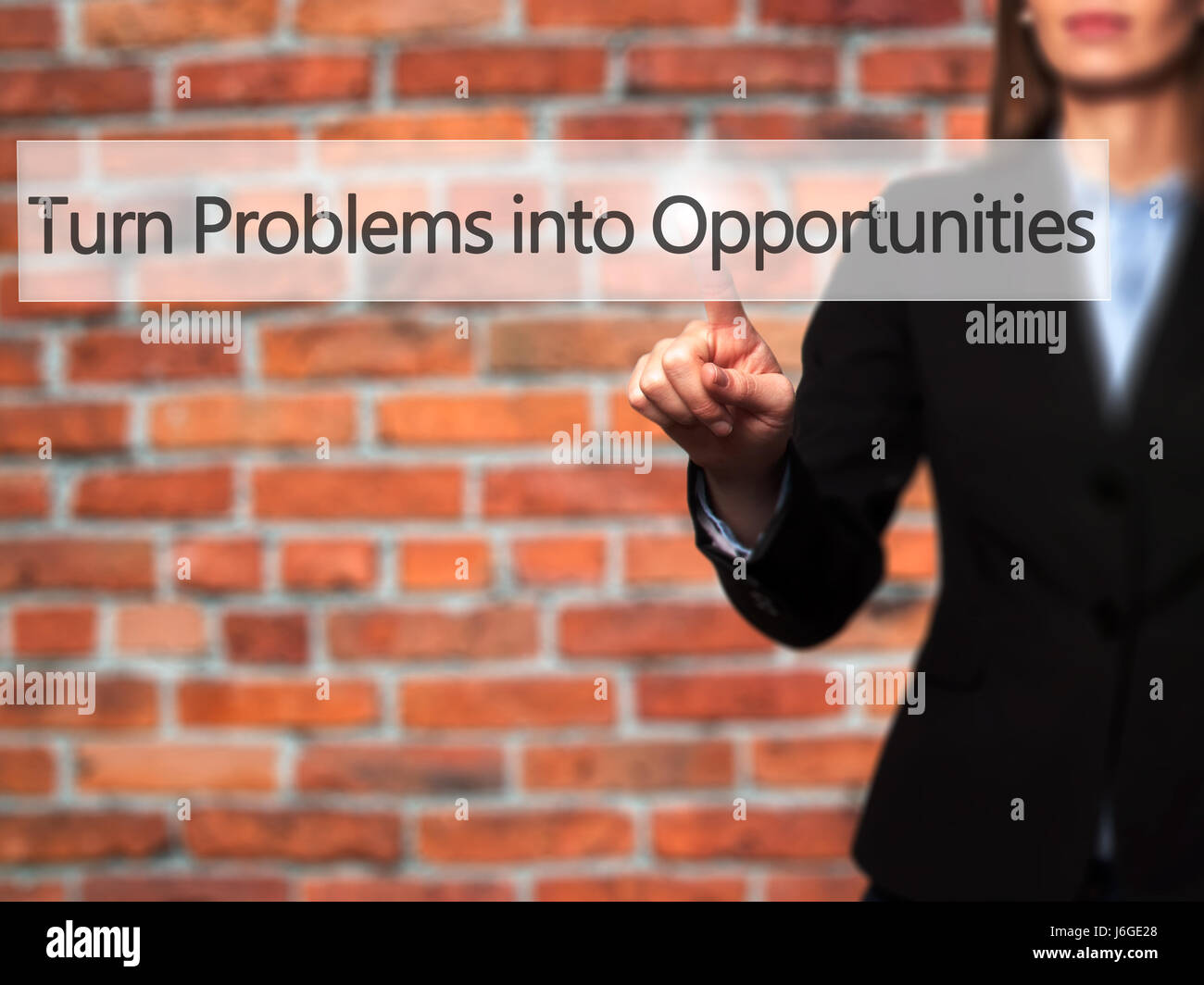 Turn Problems into Opportunities - Businesswoman hand pressing button on touch screen interface ...