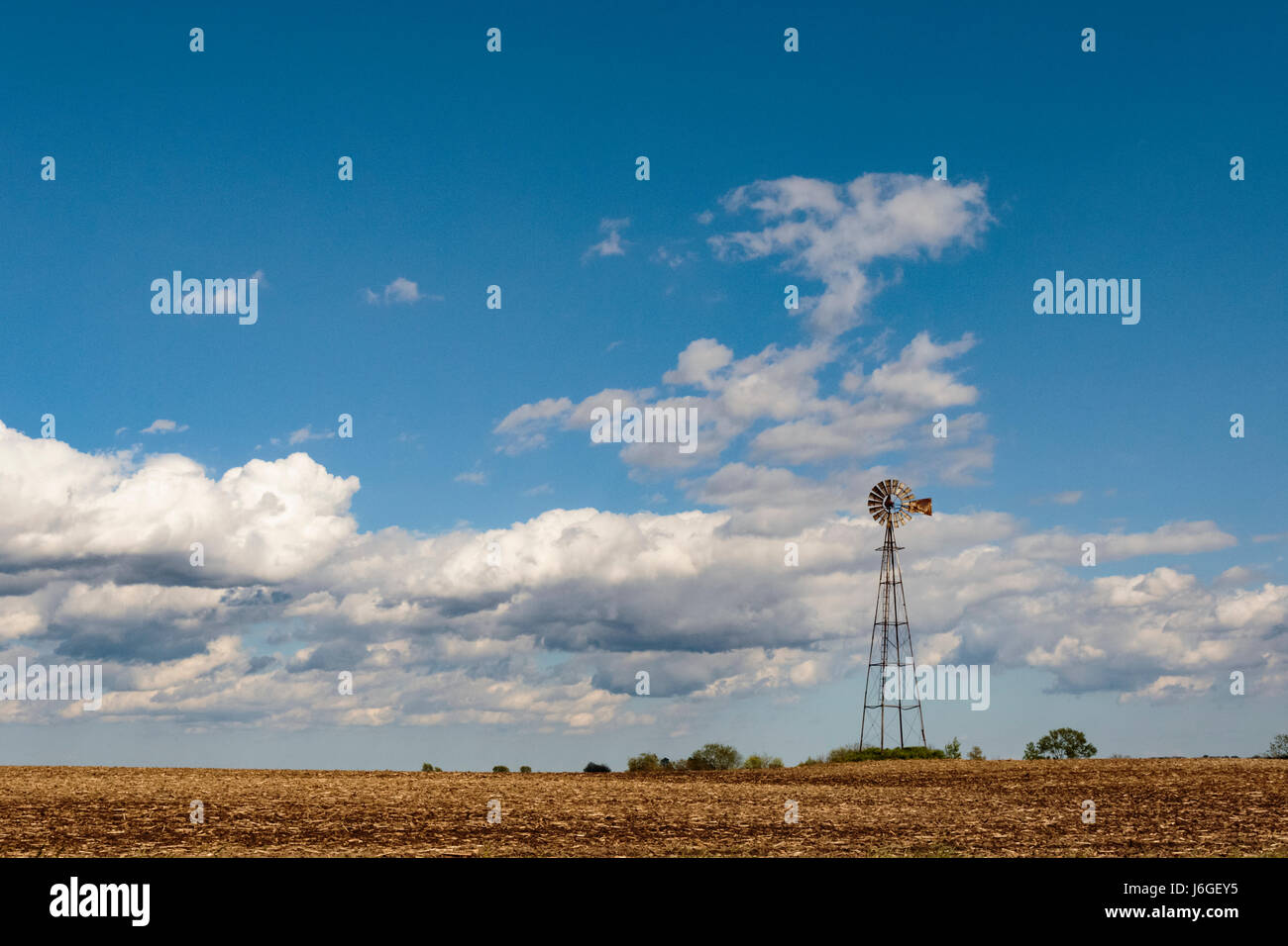 Windmill at work Stock Photo - Alamy