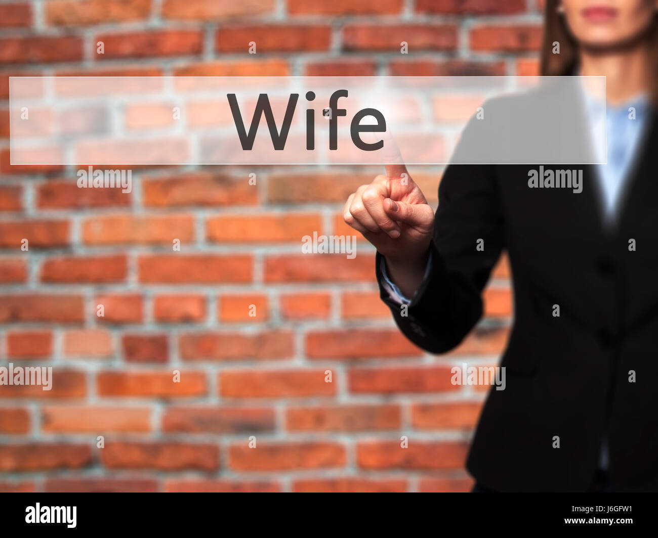 Wife - Businesswoman pressing high tech modern button on a virtual ...