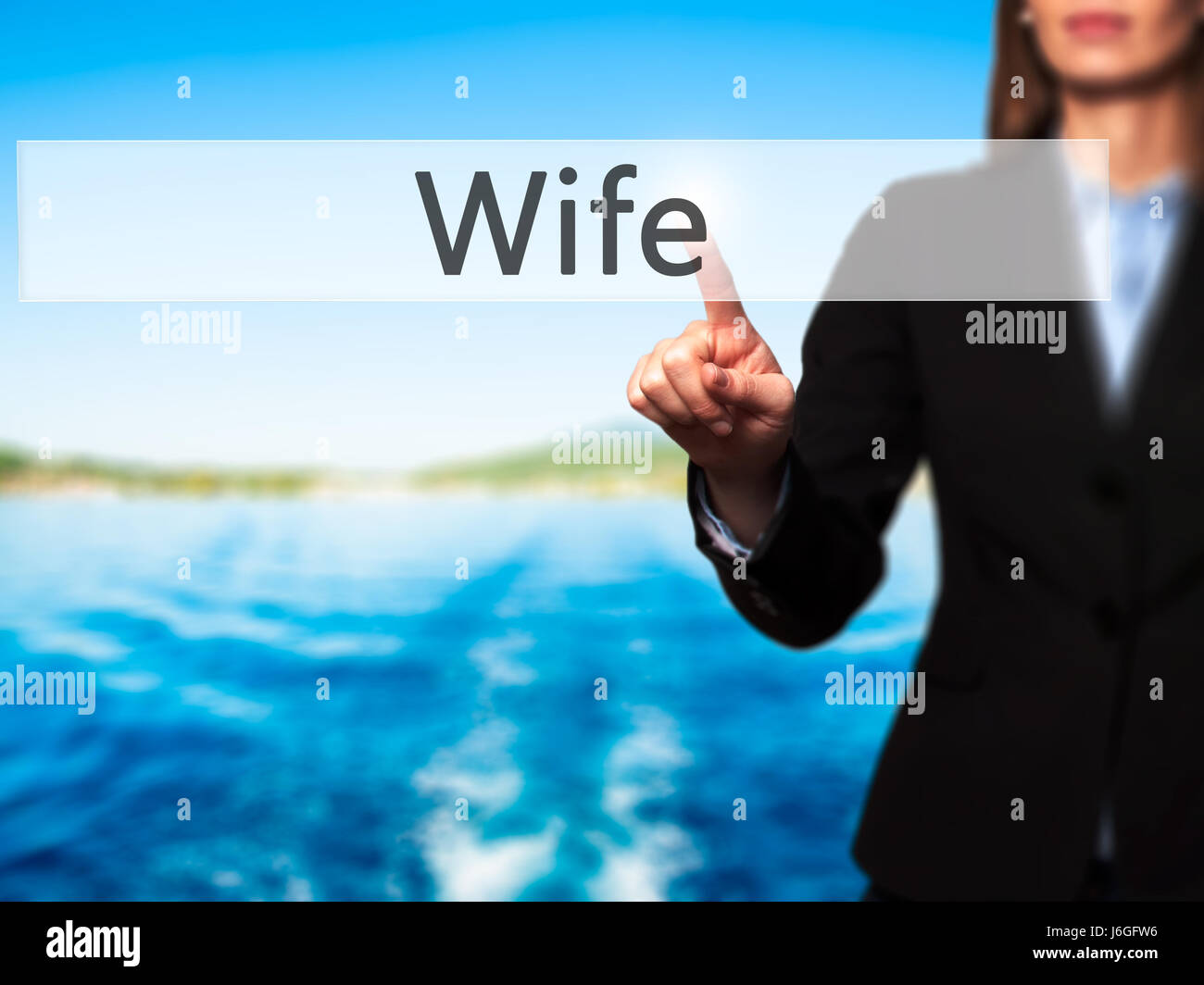 Wife - Businesswoman pressing high tech modern button on a virtual ...