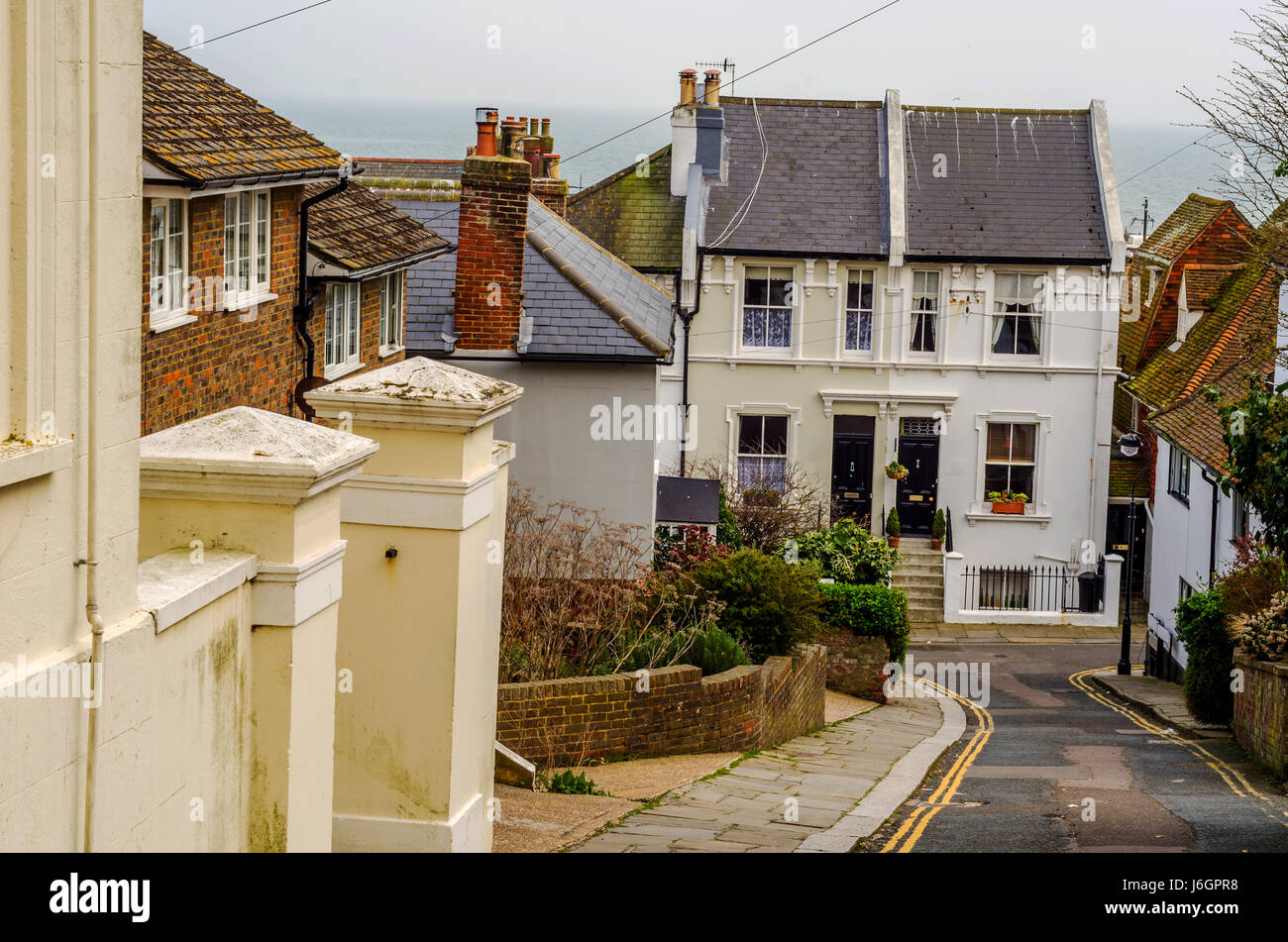 Typical English architecture, residential buildings in a row along the ...