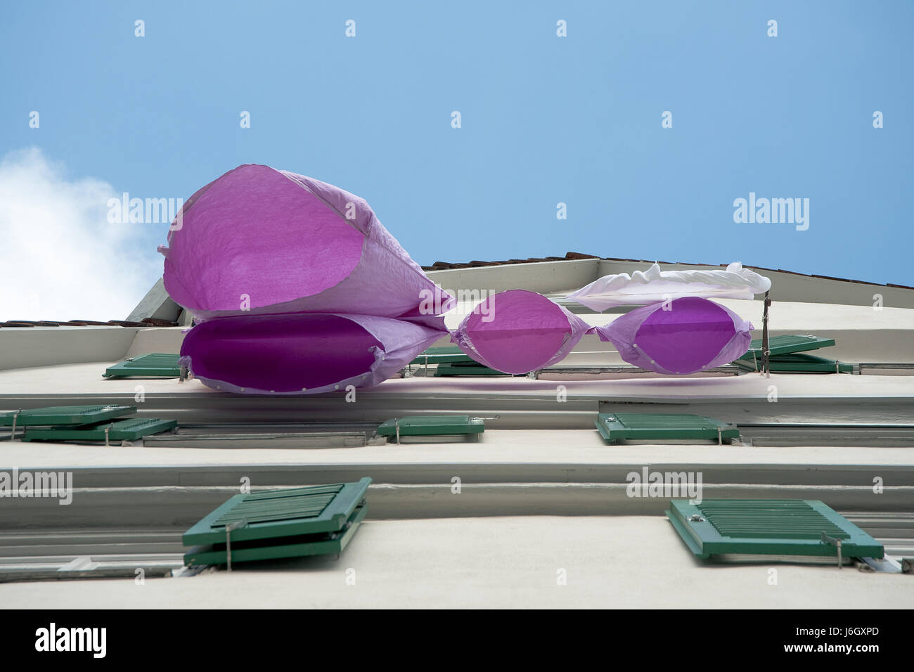outside wet facade wash washing dry laundry fresh house building ...