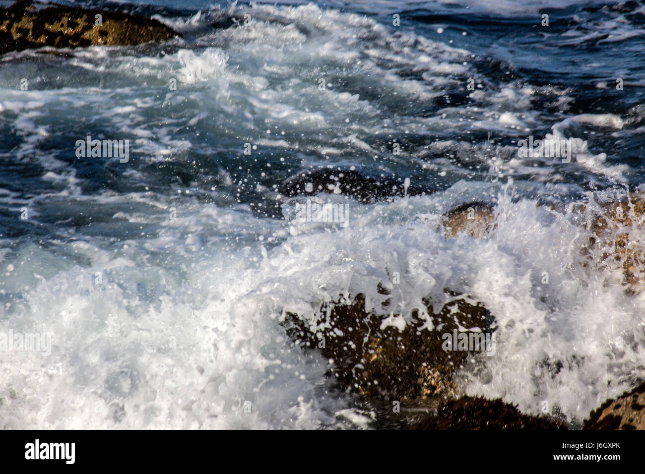Waves crashing on shoreline west hi-res stock photography and images ...