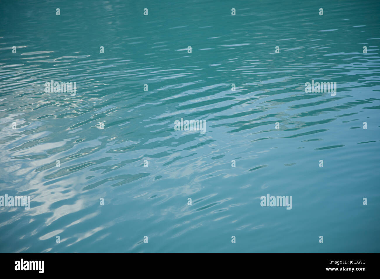 blue waters waves surface area flat salt water sea ocean water backdrop ...