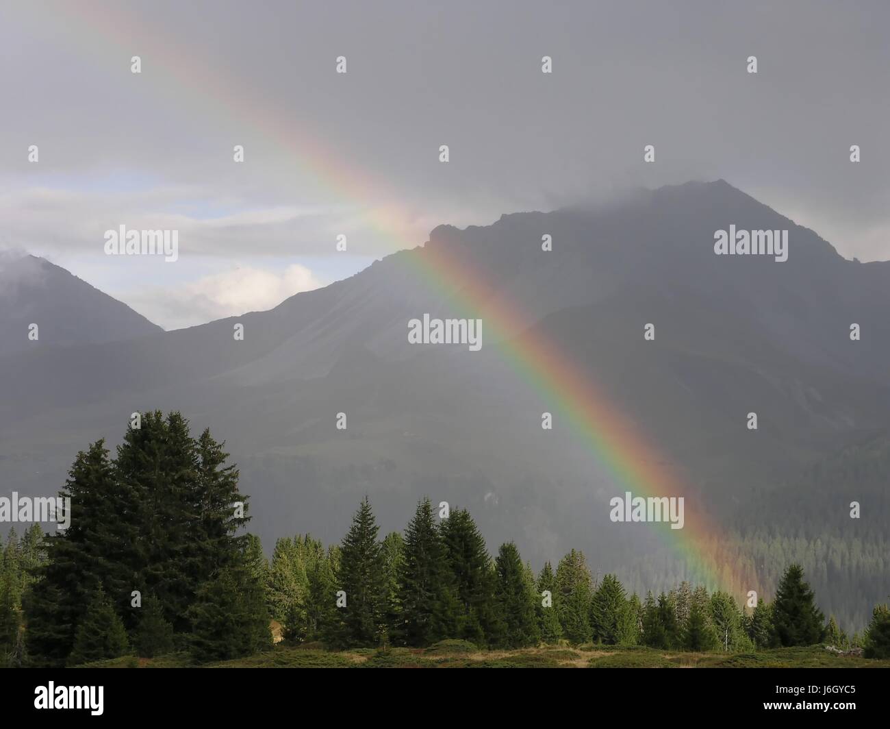 rainbow firmament sky mountain weather alps raindrop sunlight sunbeam ...
