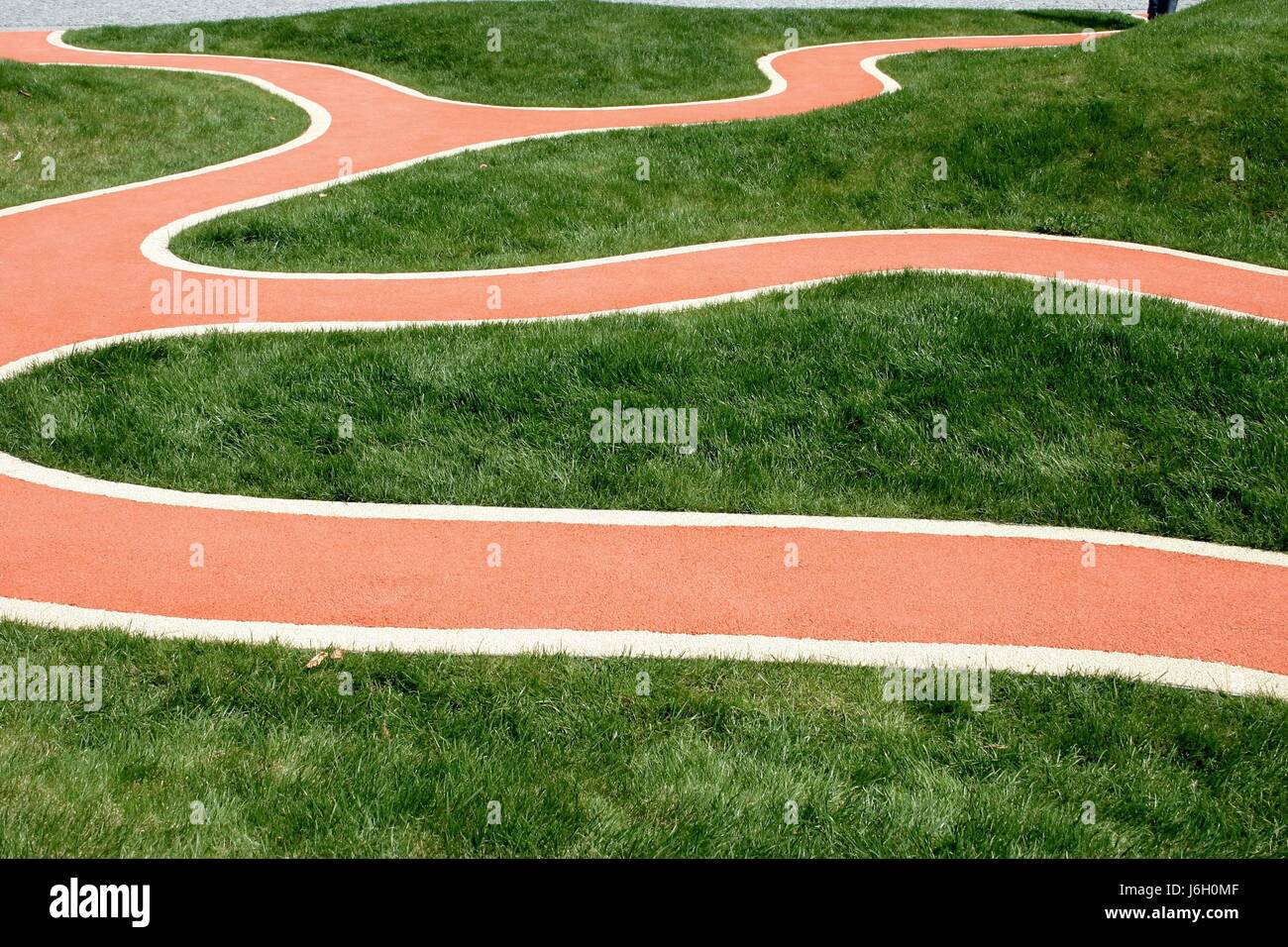 bend infinite artificial path way meadow grass lawn green tartan track ...