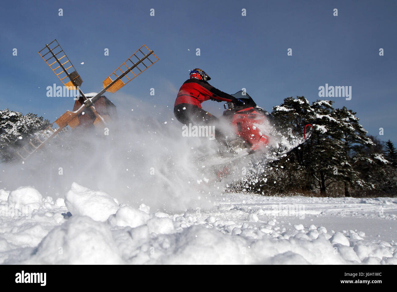 snowmobile takes off Stock Photo - Alamy