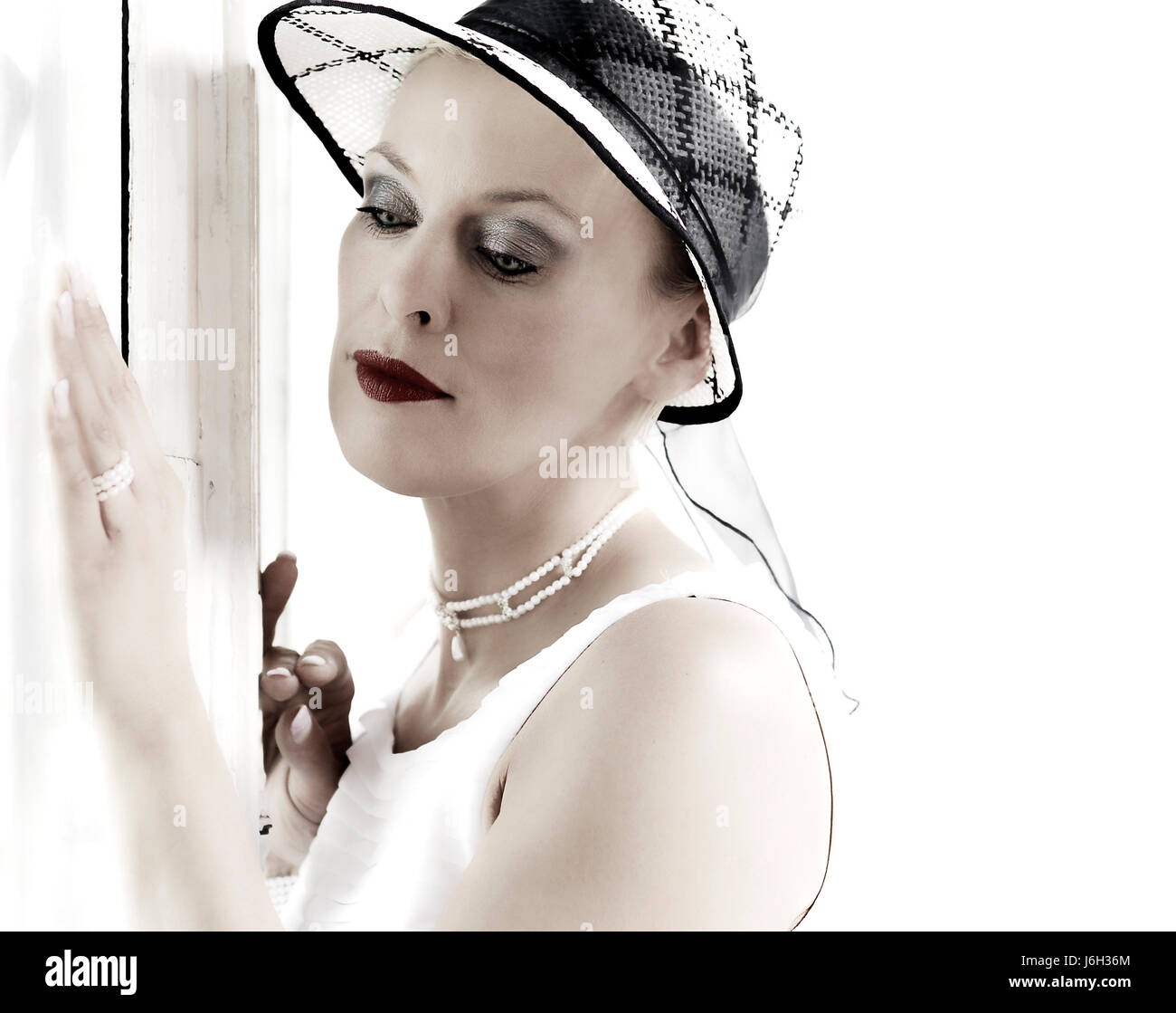 woman hat eyes look glancing see view looking peeking looking at lips ...