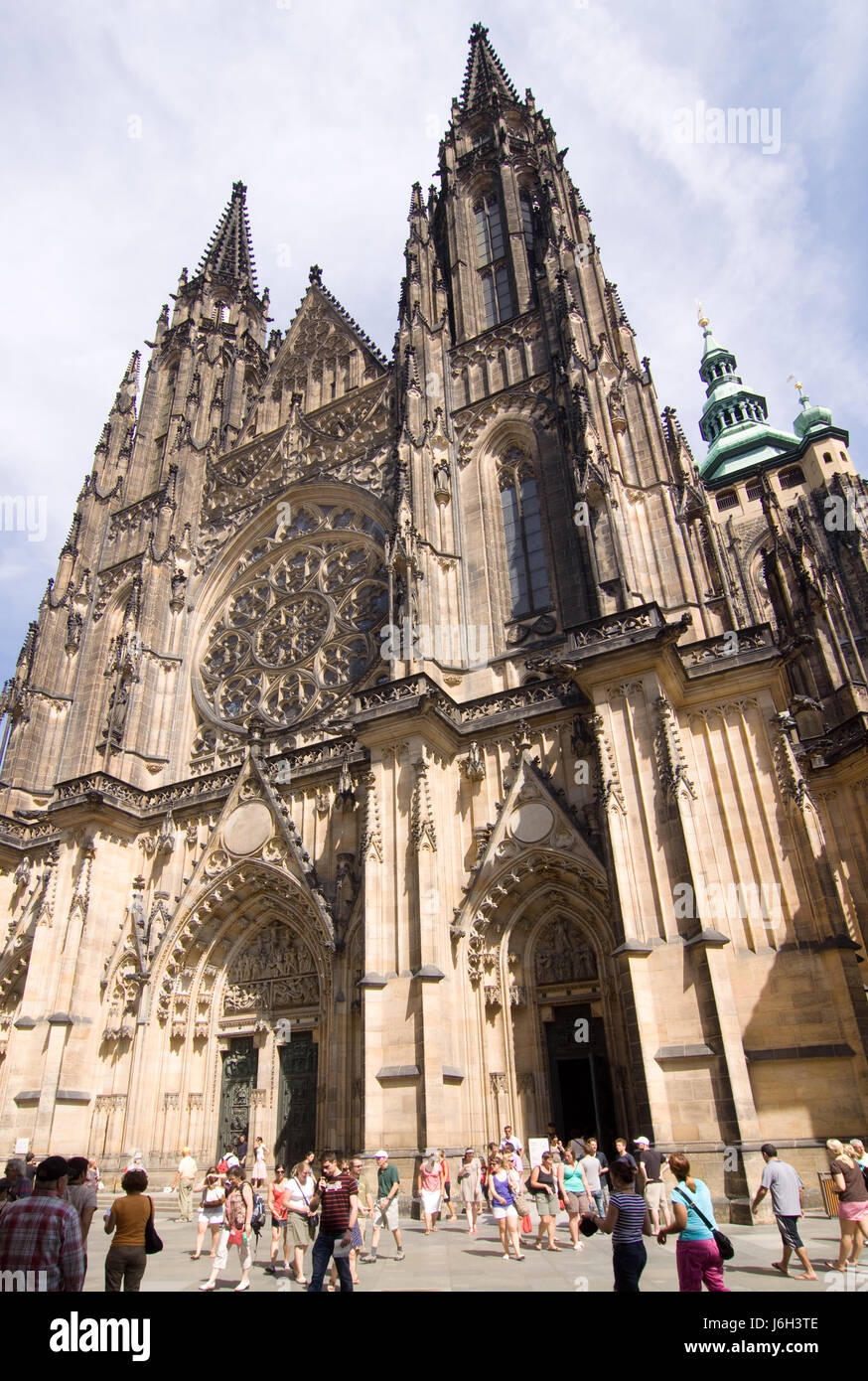 church cathedral prague towers czechia passersby church window porthole ...