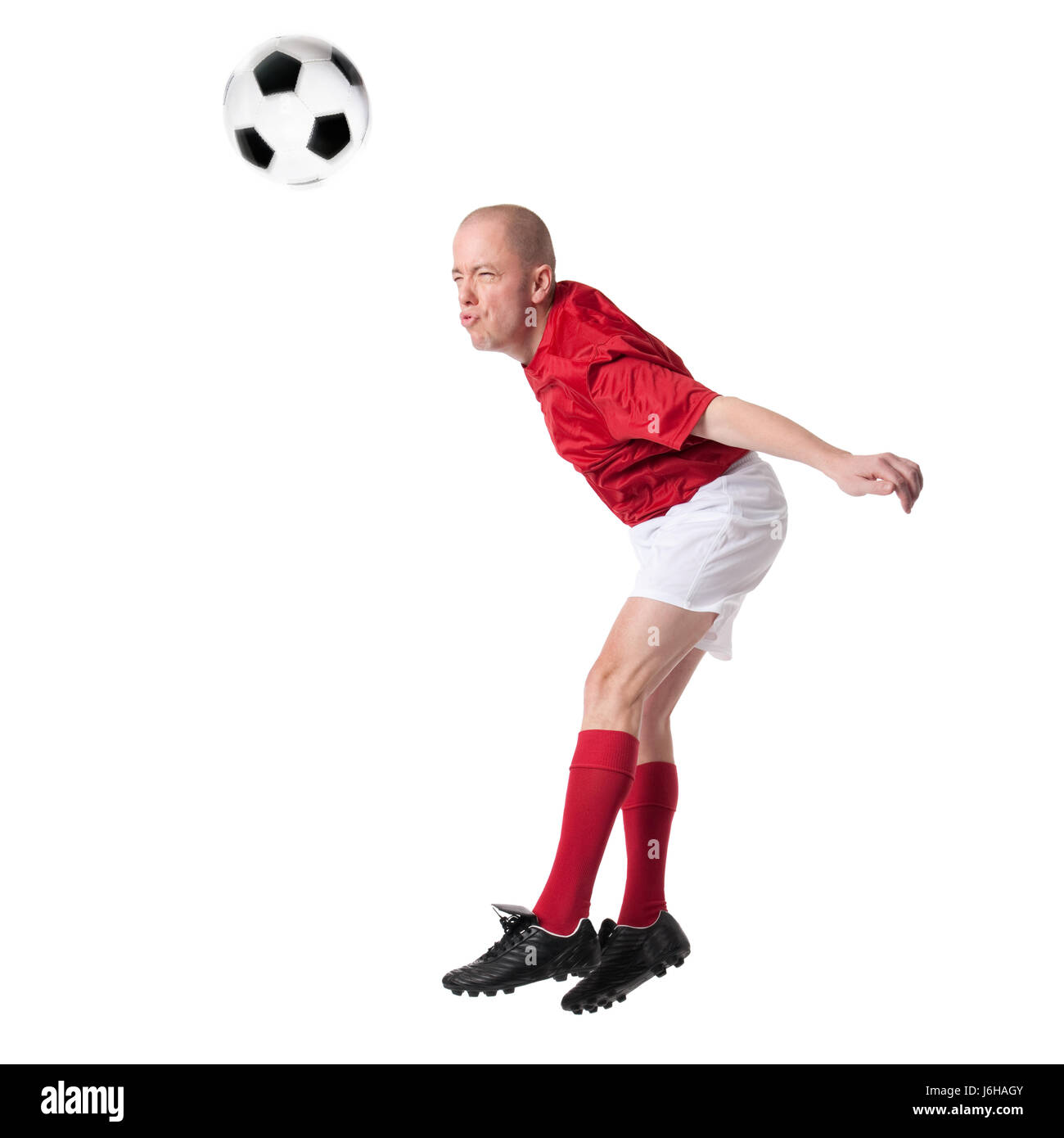 Football jump action header hi-res stock photography and images - Alamy