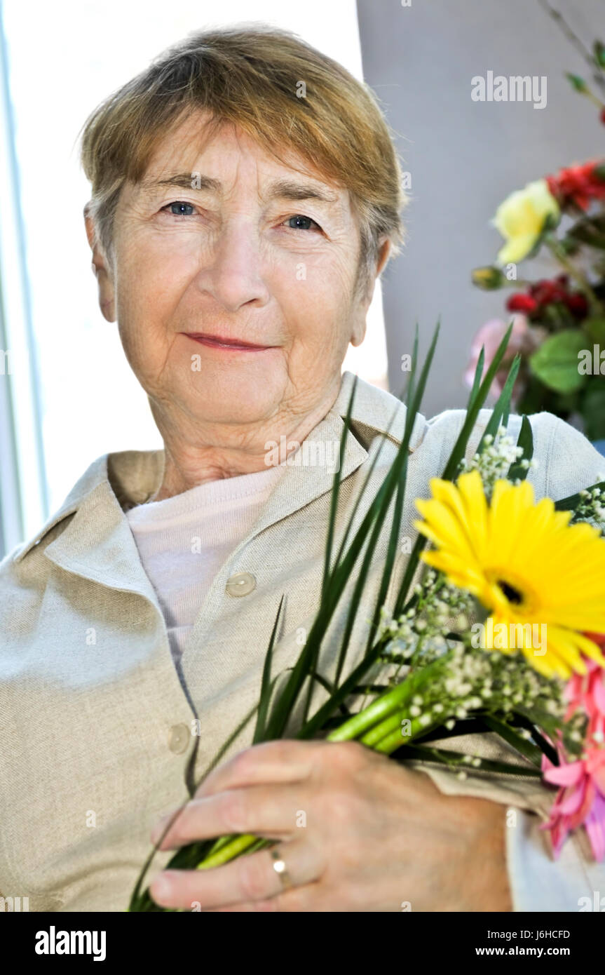 woman flower flowers plant bouquet possession holding elderly senior ...