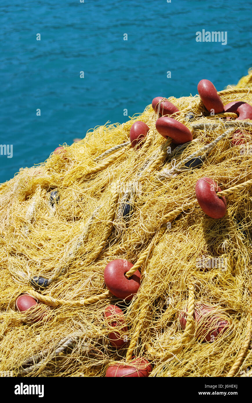 net fisherman fishery salt water sea ocean water fishing net yellow ...
