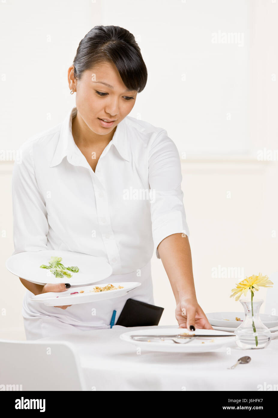 Person Clearing The Table