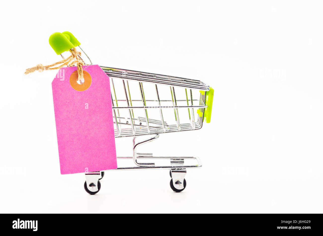 Blank pink paper price tag with shopping cart isolated on white ...