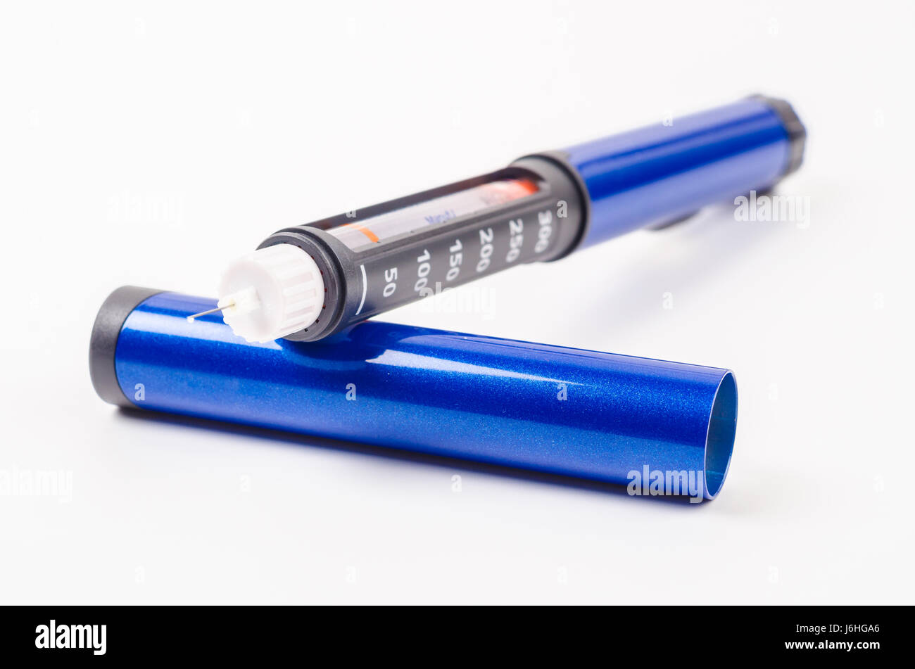 Insulin pen fill with needle on white background Stock Photo - Alamy