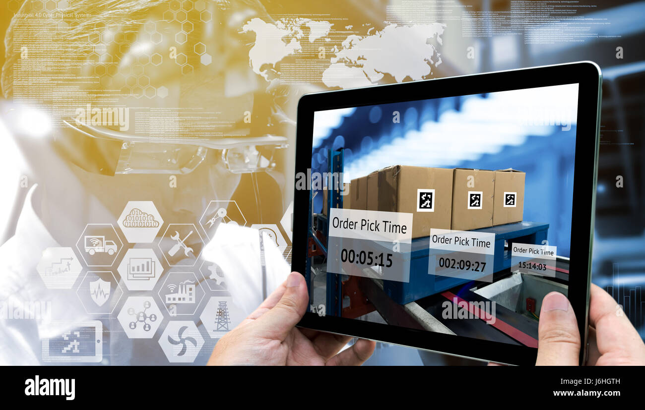 Industry 4.0,Augmented reality and smart logistic concept. Hand holding ...