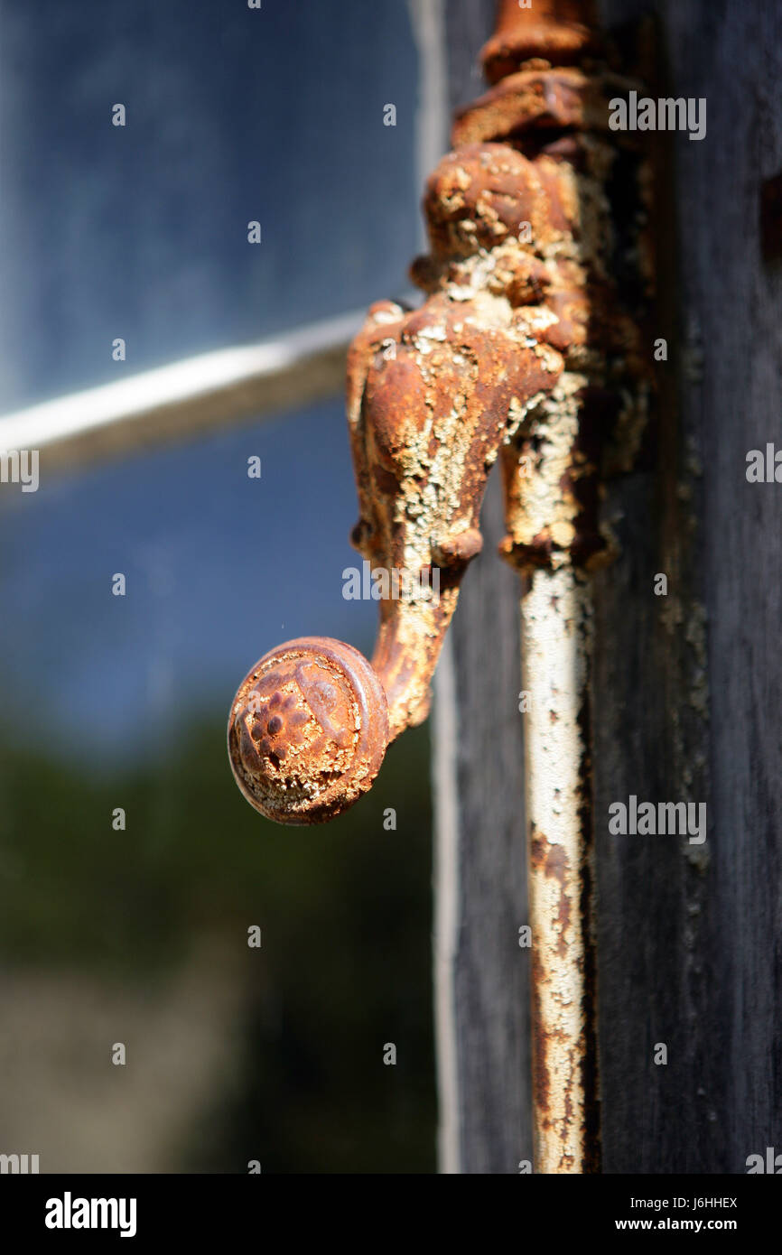 rusty,handle of an old window,detail of a window Stock Photo - Alamy