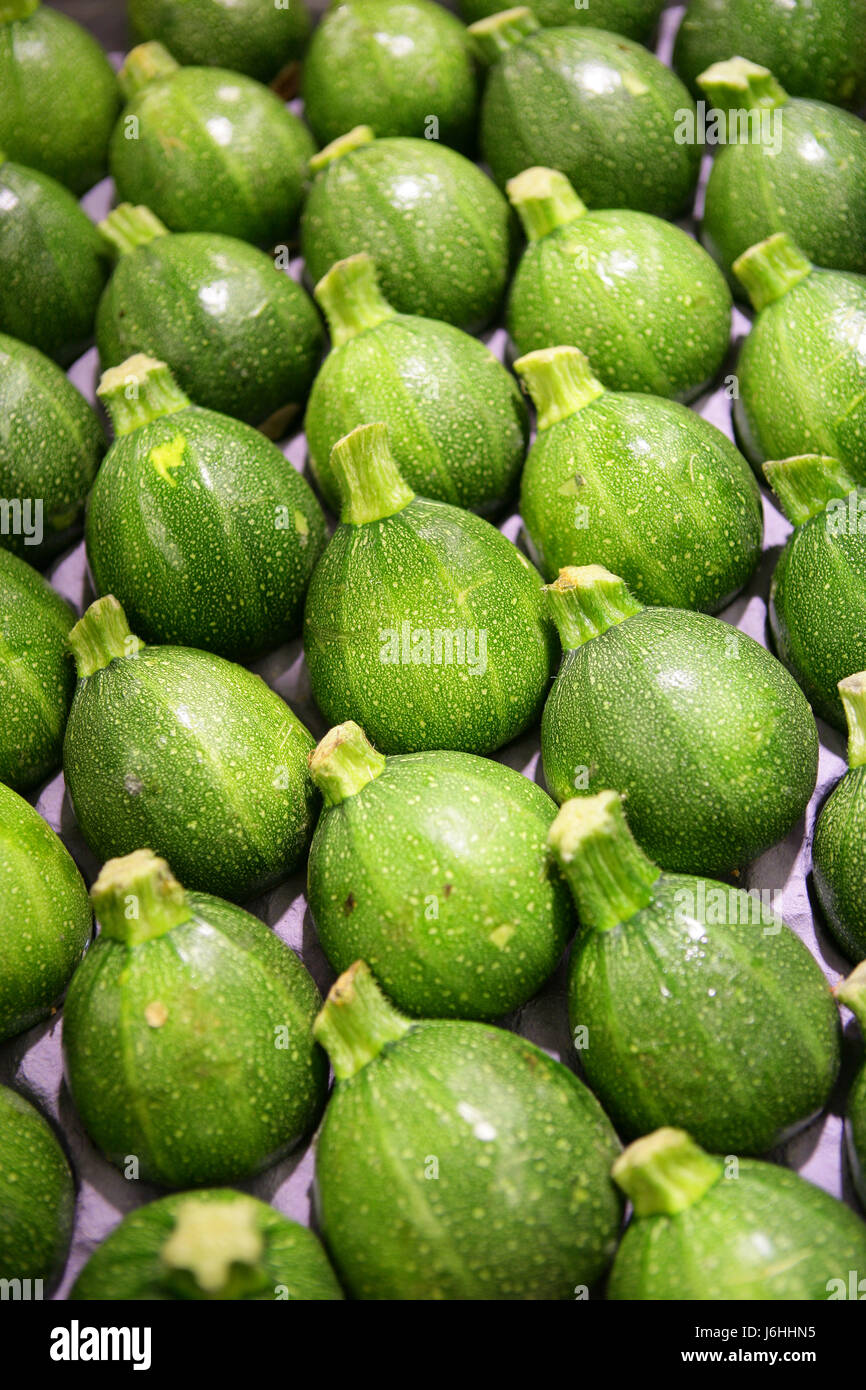 food,aliment,vertical,array of round courgettes,green fruit Stock Photo ...