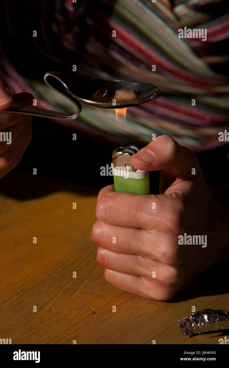 woman flame flames lighter heroin addict spoon woman humans human ...