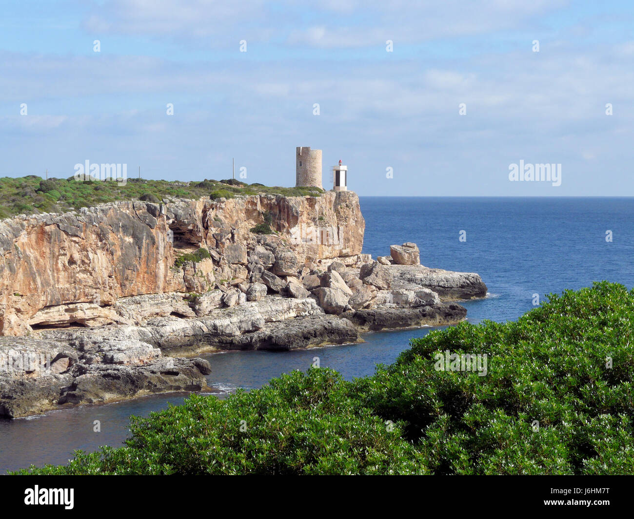 mallorca rock bay steep coast cliff watchtower lighthouse blue tower ...