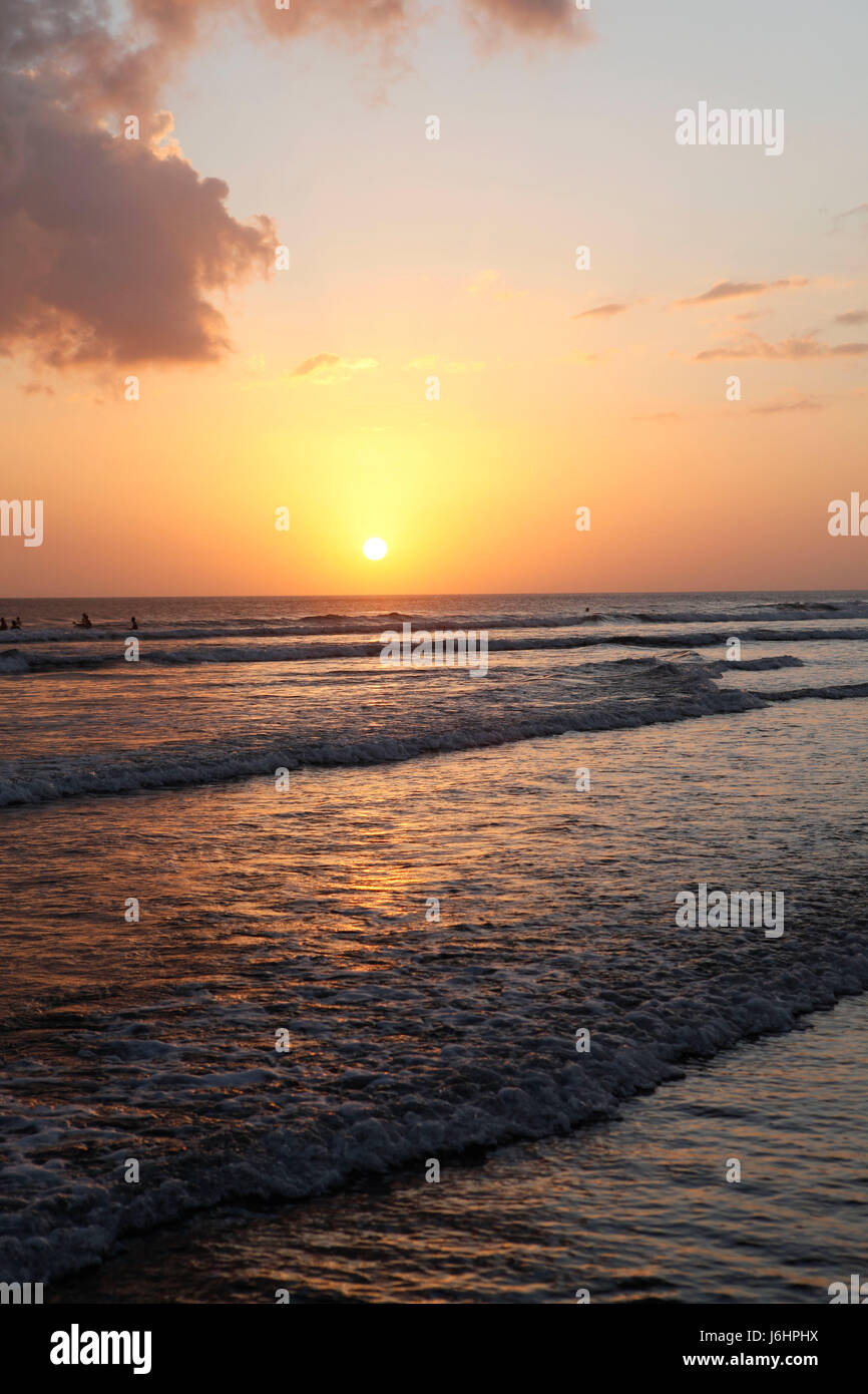 sunset bali indonesia beach seaside the beach seashore evening vertical ...
