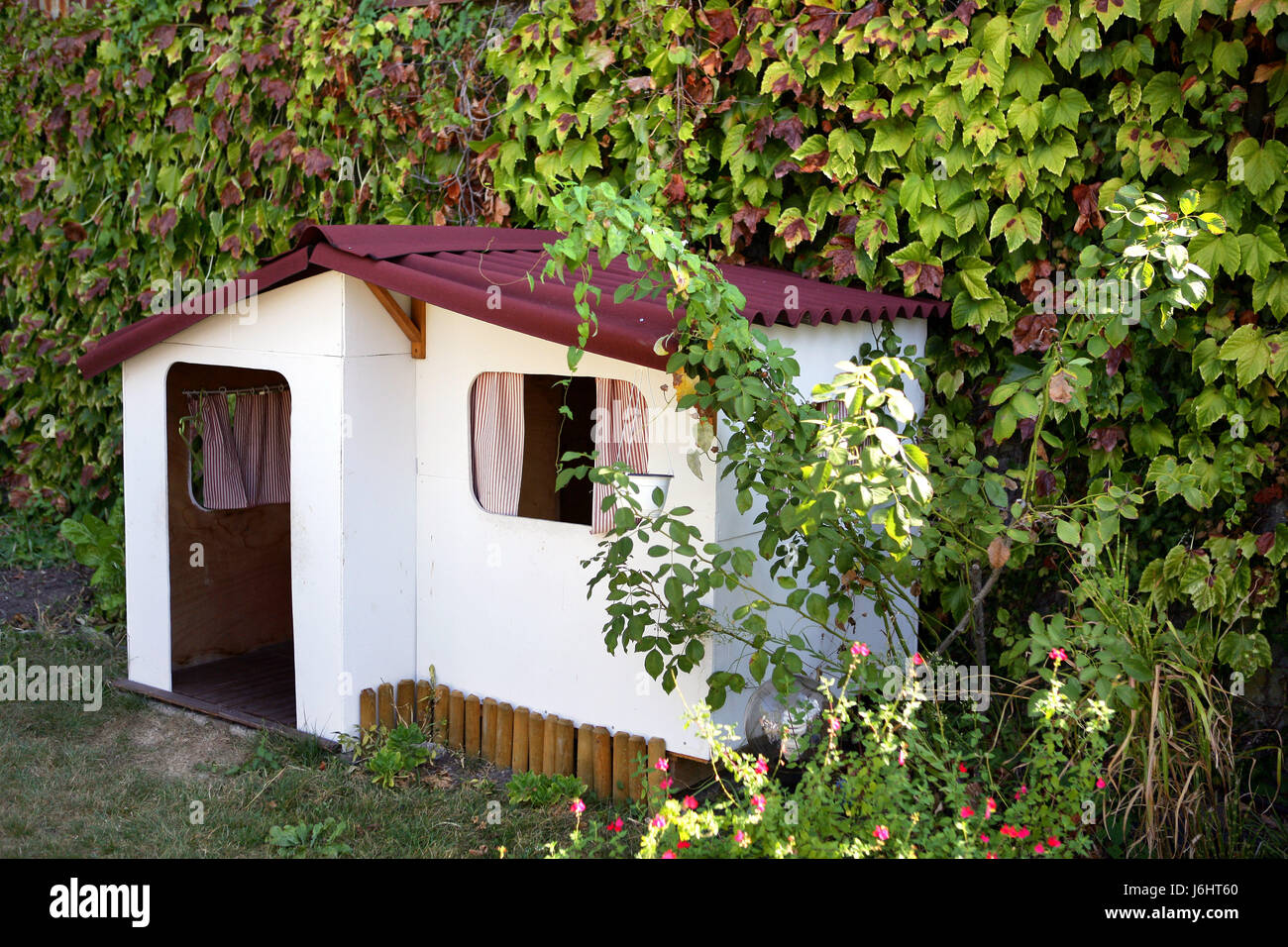 horizontal,outside,child,children,kids,hut child,in a garden Stock ...