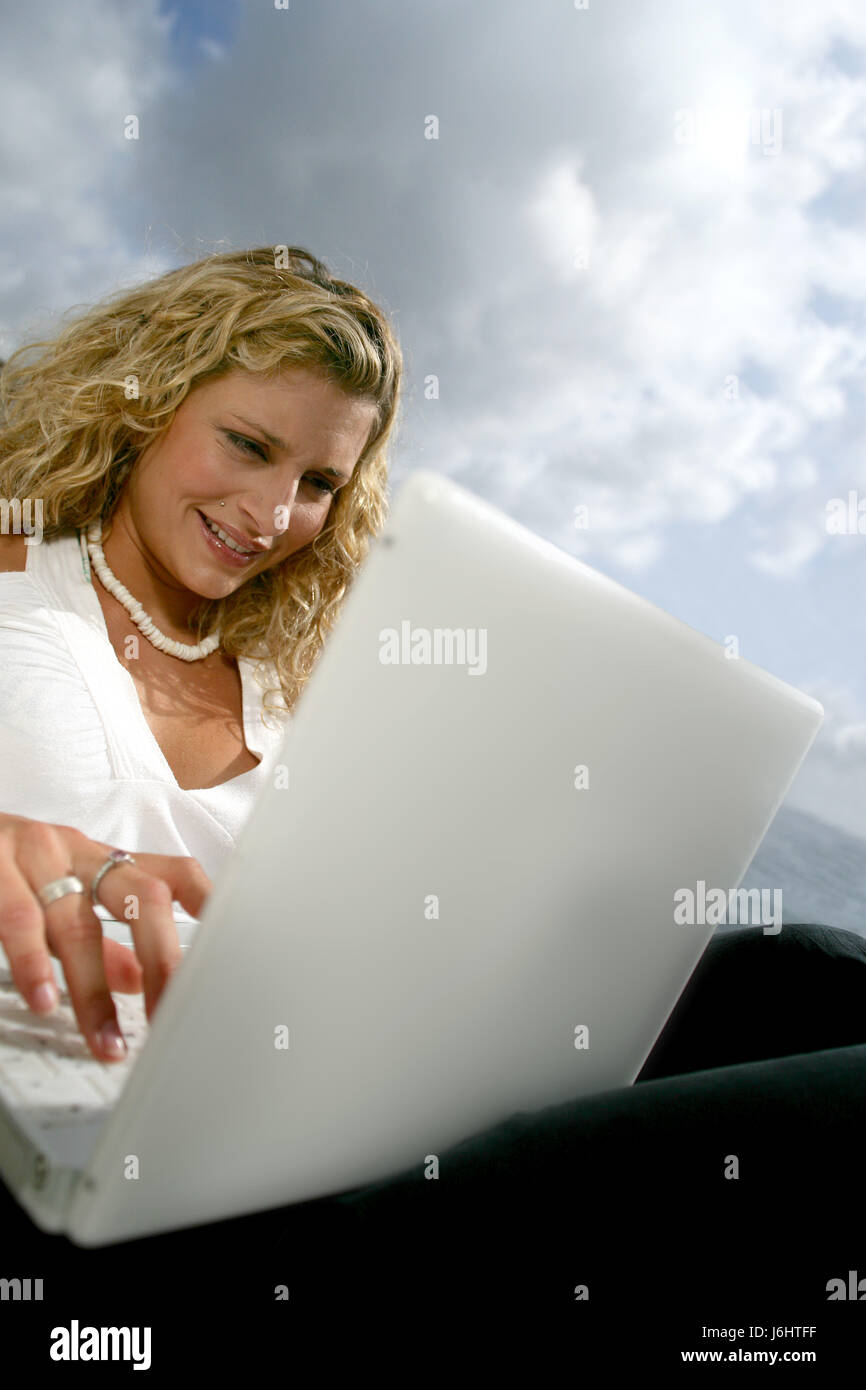 woman profile laptop notebook computers computer laugh laughs laughing ...