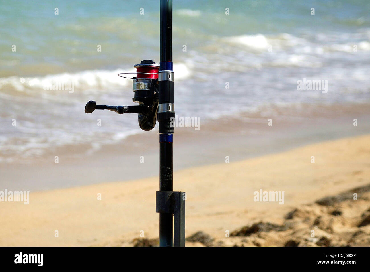 beach seaside the beach seashore fishing rod reel salt water sea ocean ...