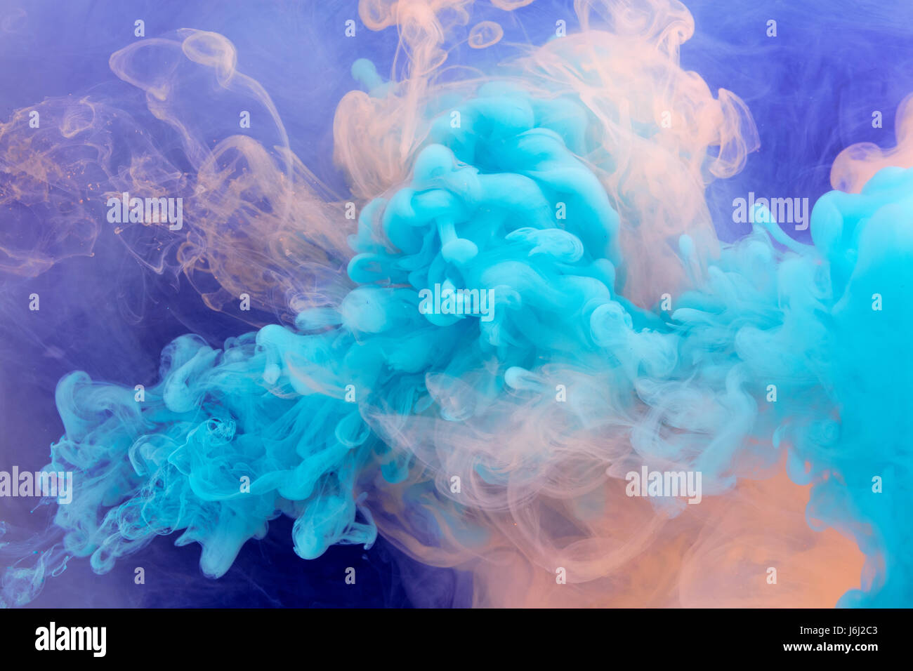 Acrylic colors and ink in water background Stock Photo - Alamy