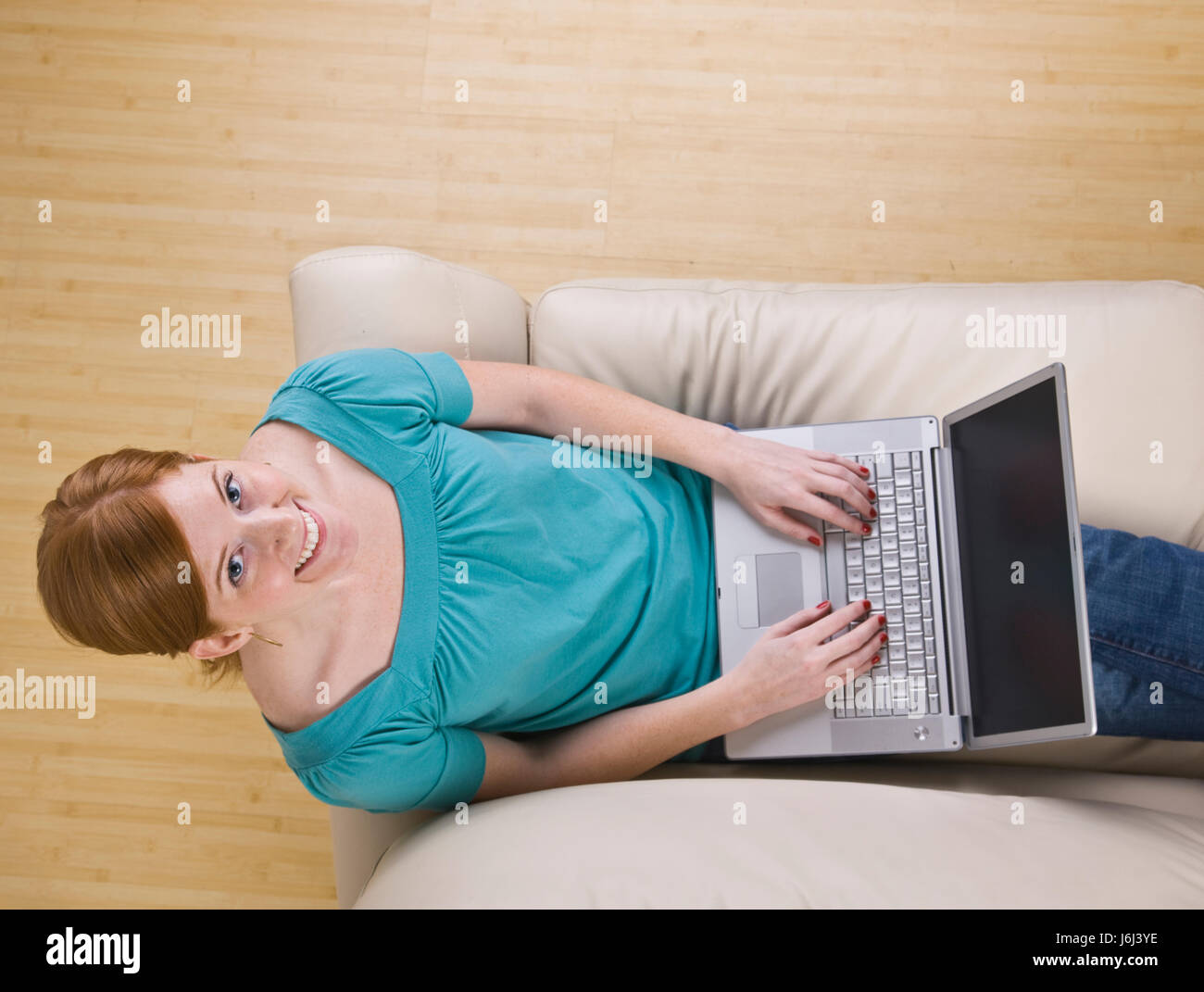 woman house building laptop notebook computers computer laugh laughs ...