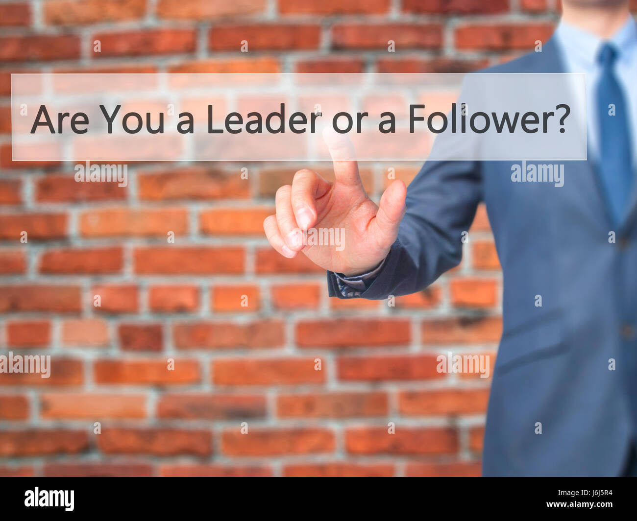 Are You a Leader or a Follower ? - Businessman press on digital screen ...