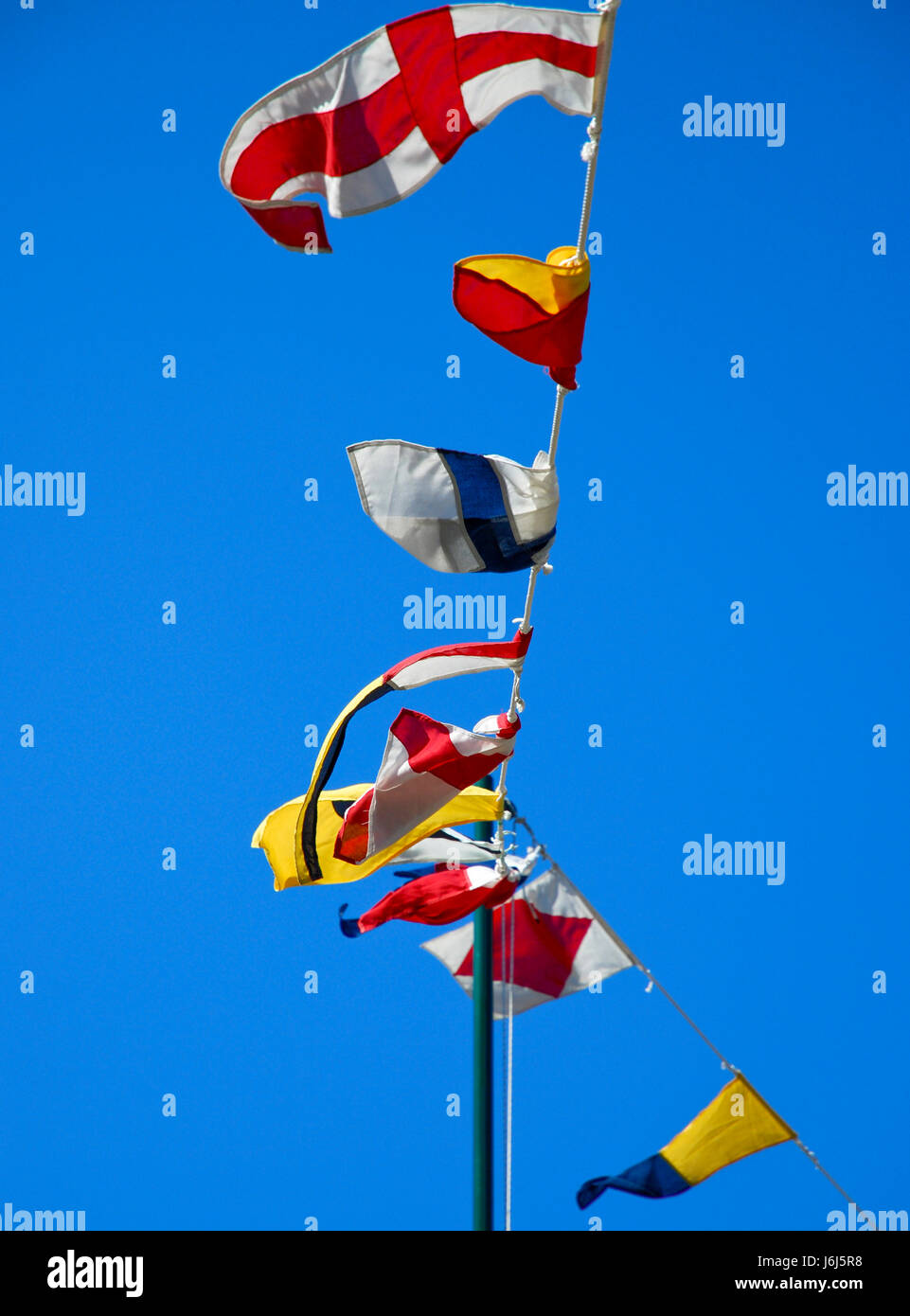 flags in the harbor of portofino Stock Photo - Alamy