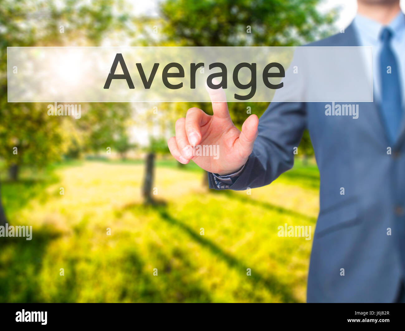Average - Businessman hand pressing button on touch screen interface ...