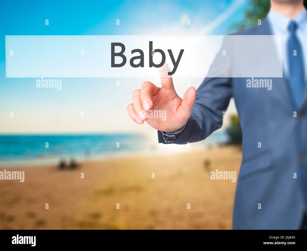 Baby - Businessman hand pressing button on touch screen interface ...