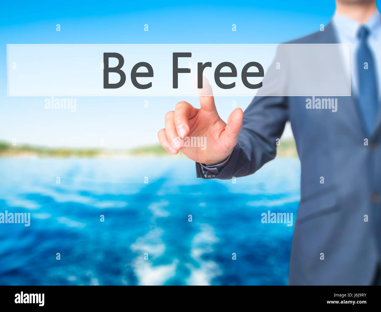 Be Free - Businessman hand pressing button on touch screen interface ...
