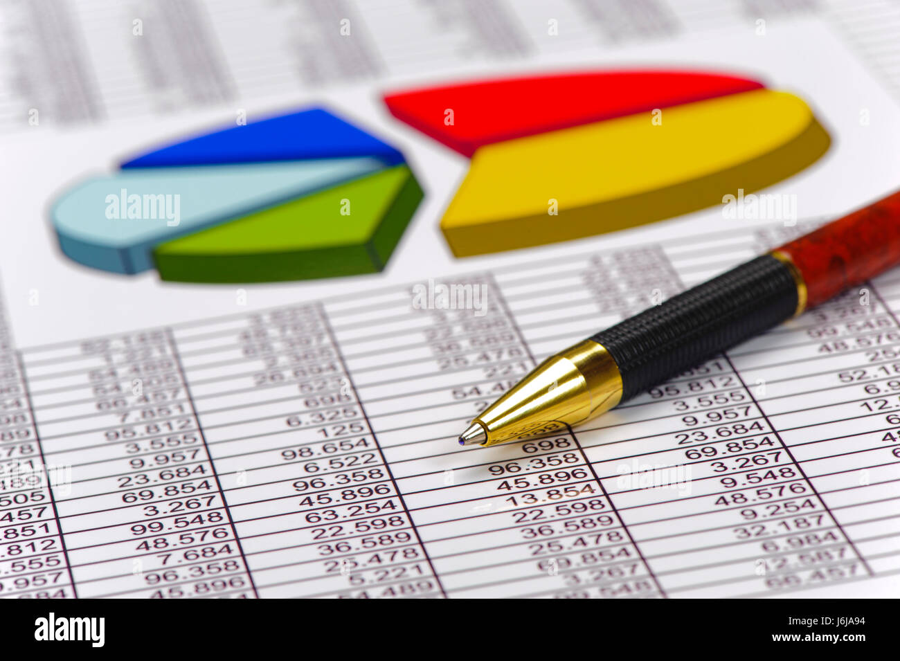 financial chart with pen and table sheet Stock Photo - Alamy