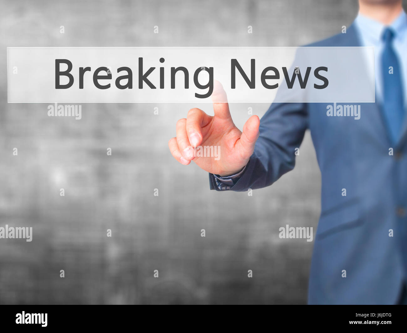 Breaking News - Businessman hand touch button on virtual screen ...