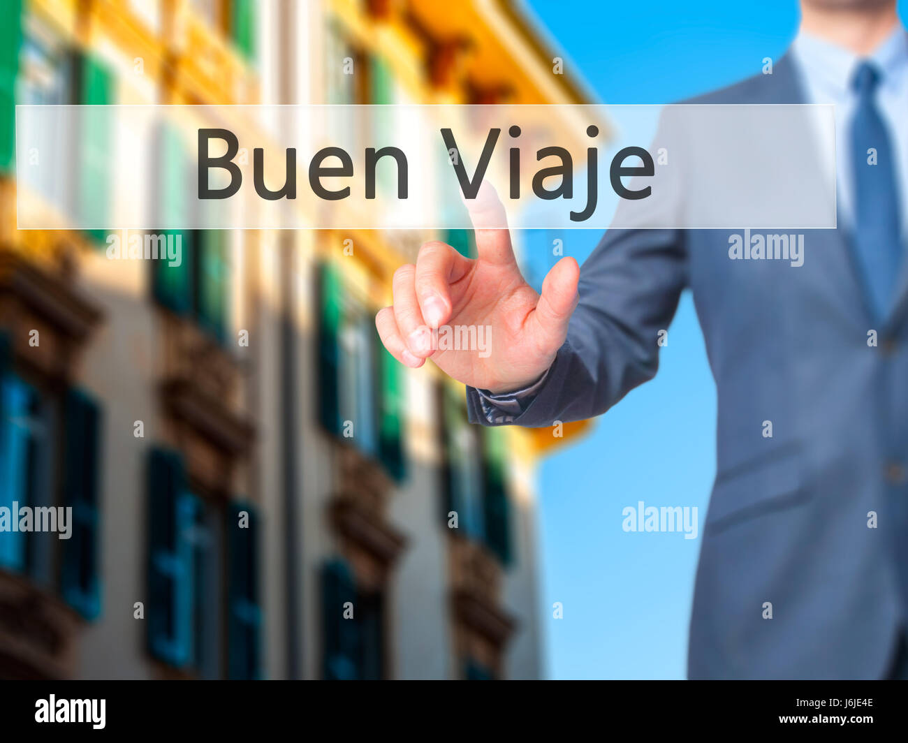 Buen Viaje (Good Trip in Spanish) - Businessman hand touch button on ...