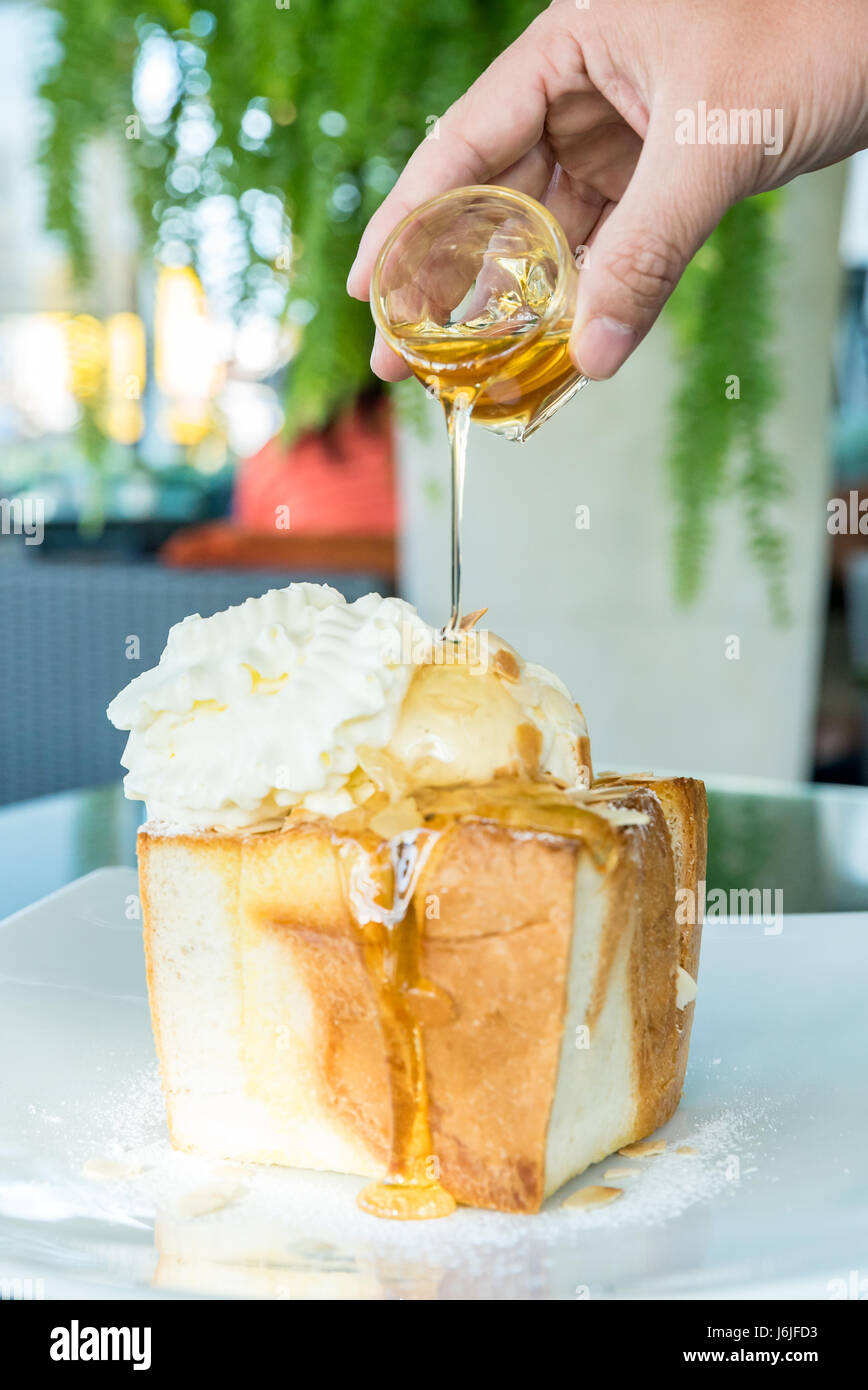 Honey Toast with maple syrup Stock Photo - Alamy