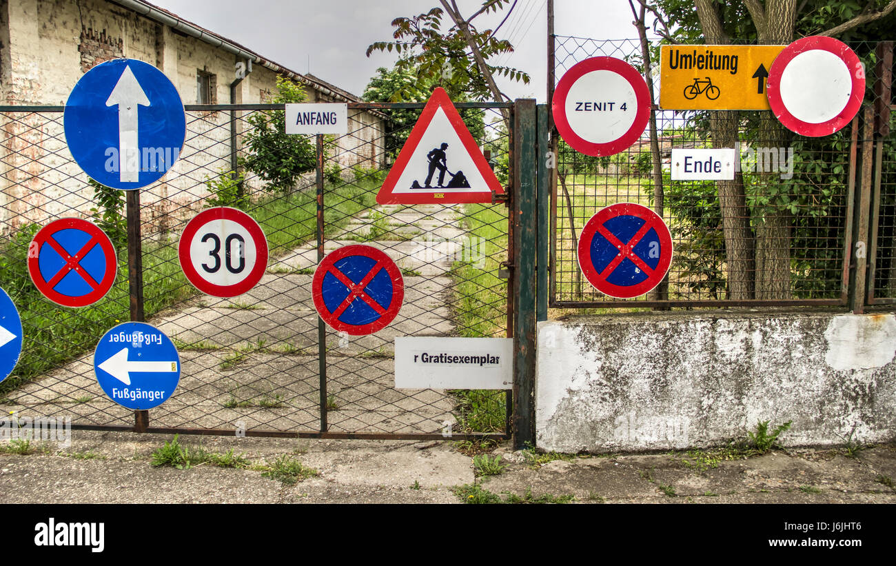 Serbia - Traffic signs on a wire fence Stock Photo - Alamy