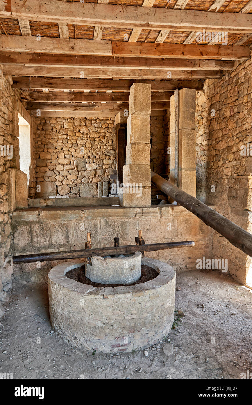 Ancient olive press hi-res stock photography and images - Alamy