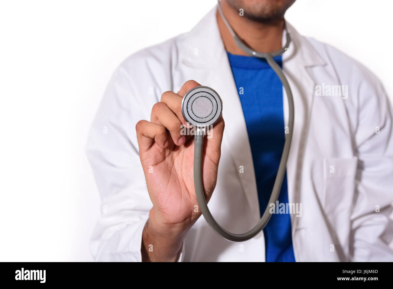 Doctor holding stethoscope Stock Photo - Alamy