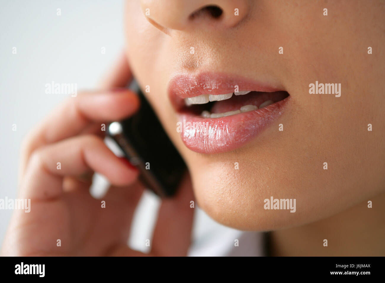 woman conversation telephone phone mouth lips front view open uncap ...