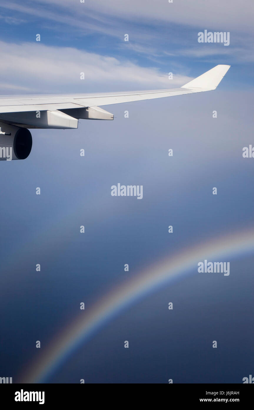 flight rainbow high pressure area firmament sky aircraft aeroplane ...