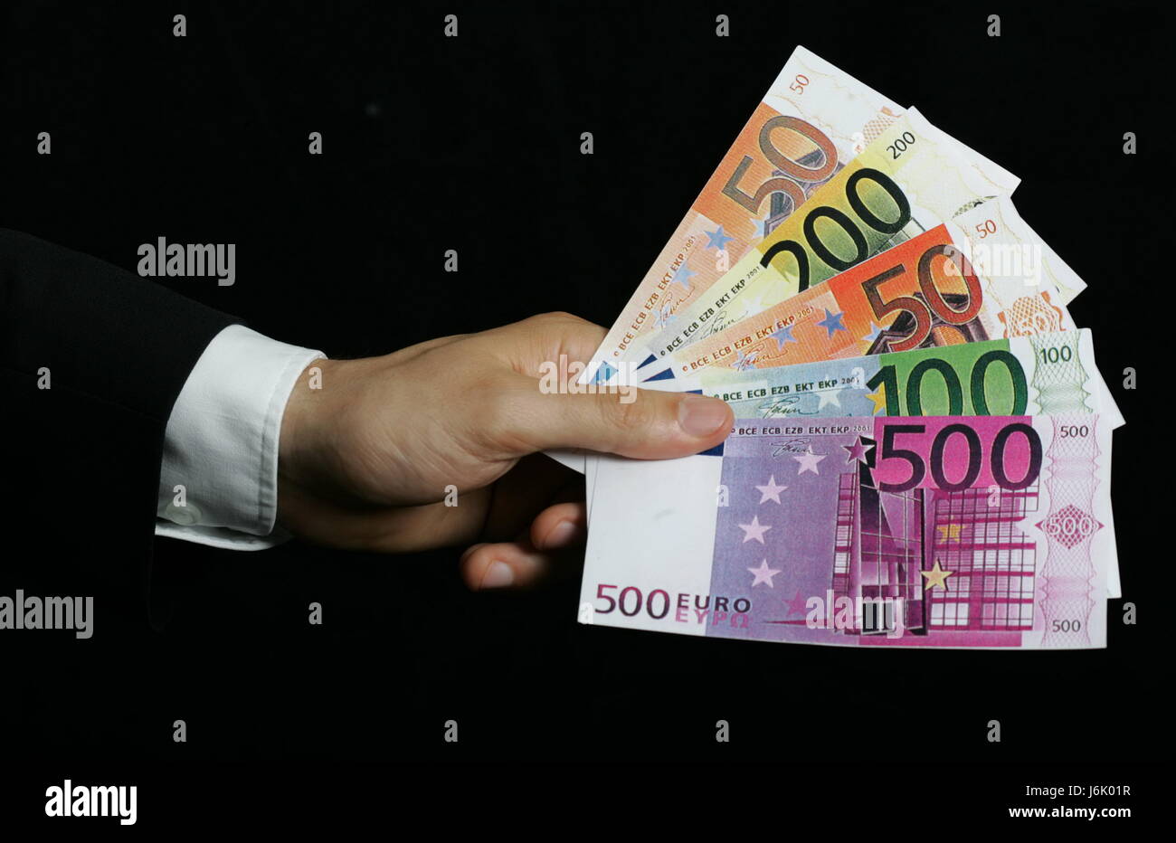 banknotes,euro banknotes in hand Stock Photo - Alamy