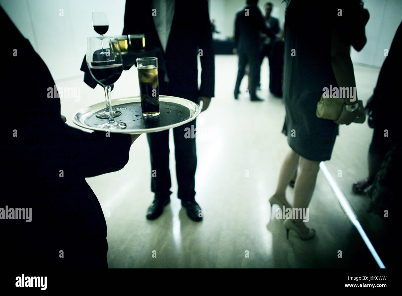 VIP wedding party evening marriage drinks reception with waiter and ...