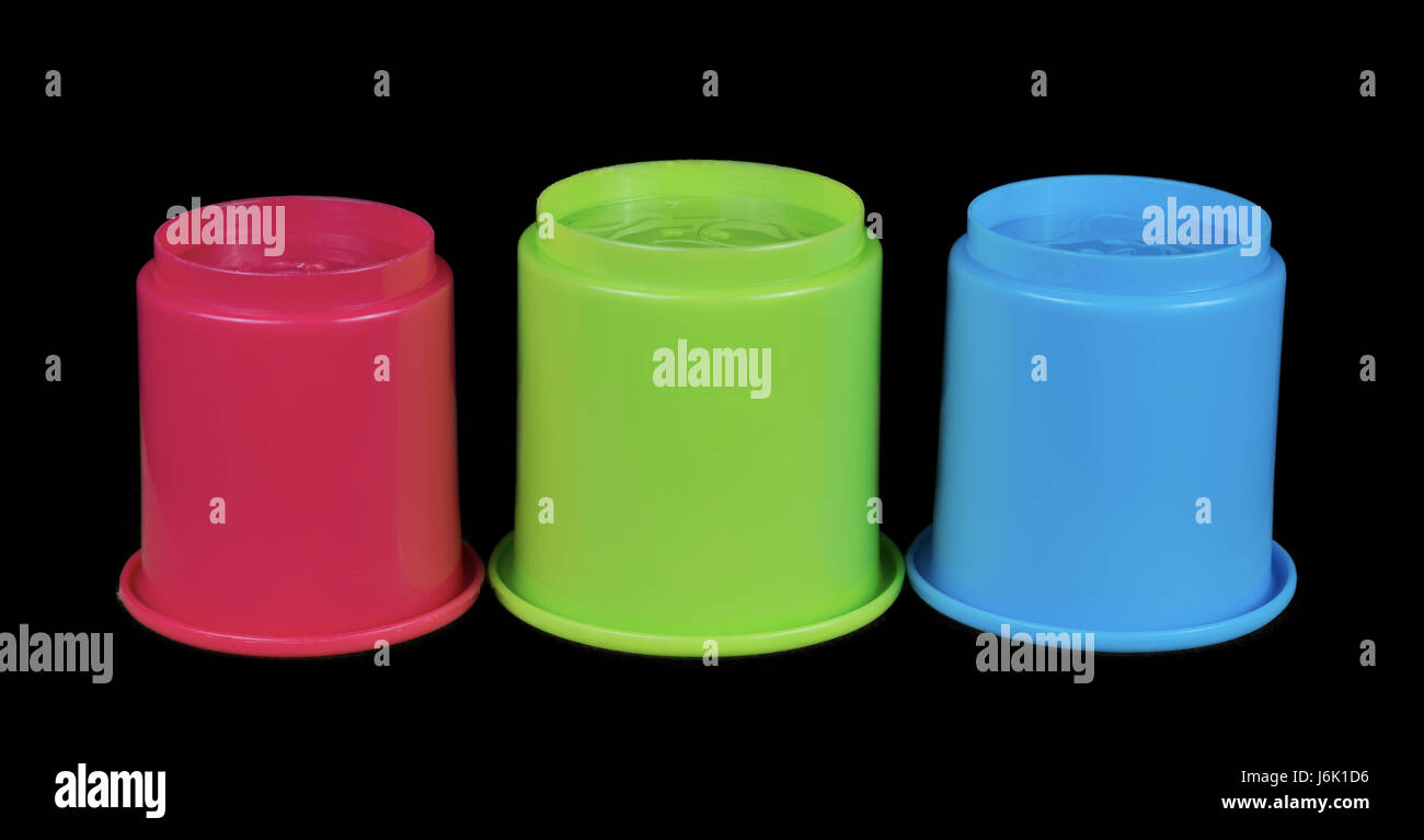 Children's red green and blue building cups that can be stacked but in ...
