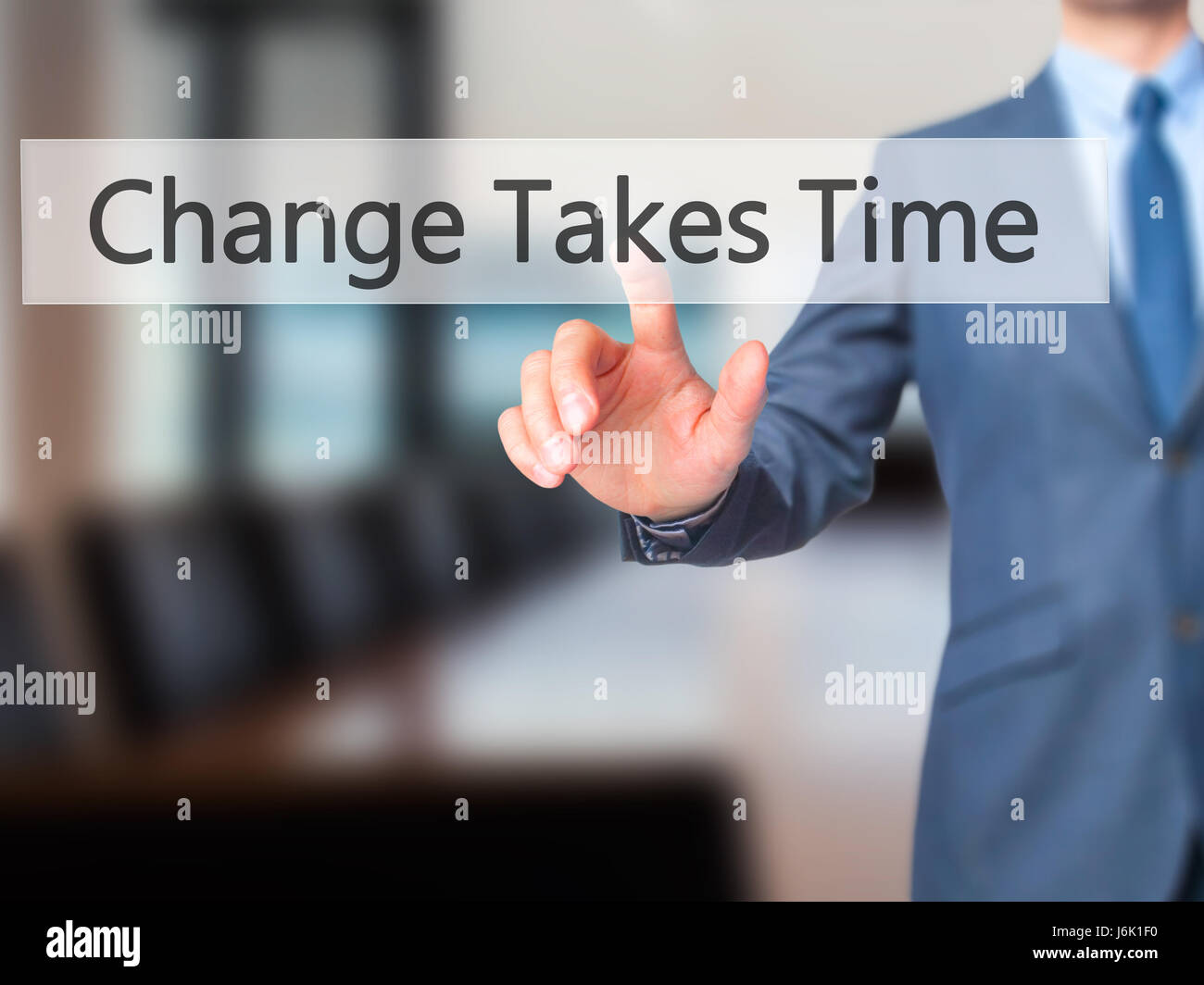 Change Takes Time - Businessman hand pressing button on touch screen ...